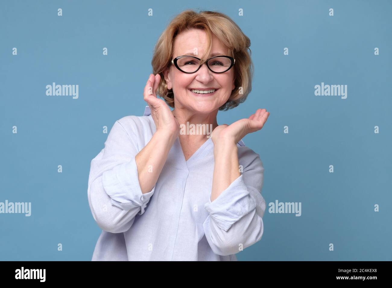 Surprised mature woman being excited surprised with compliment Stock ...