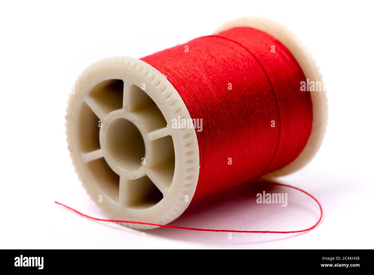 Red sewing thread Cut Out Stock Images & Pictures - Alamy