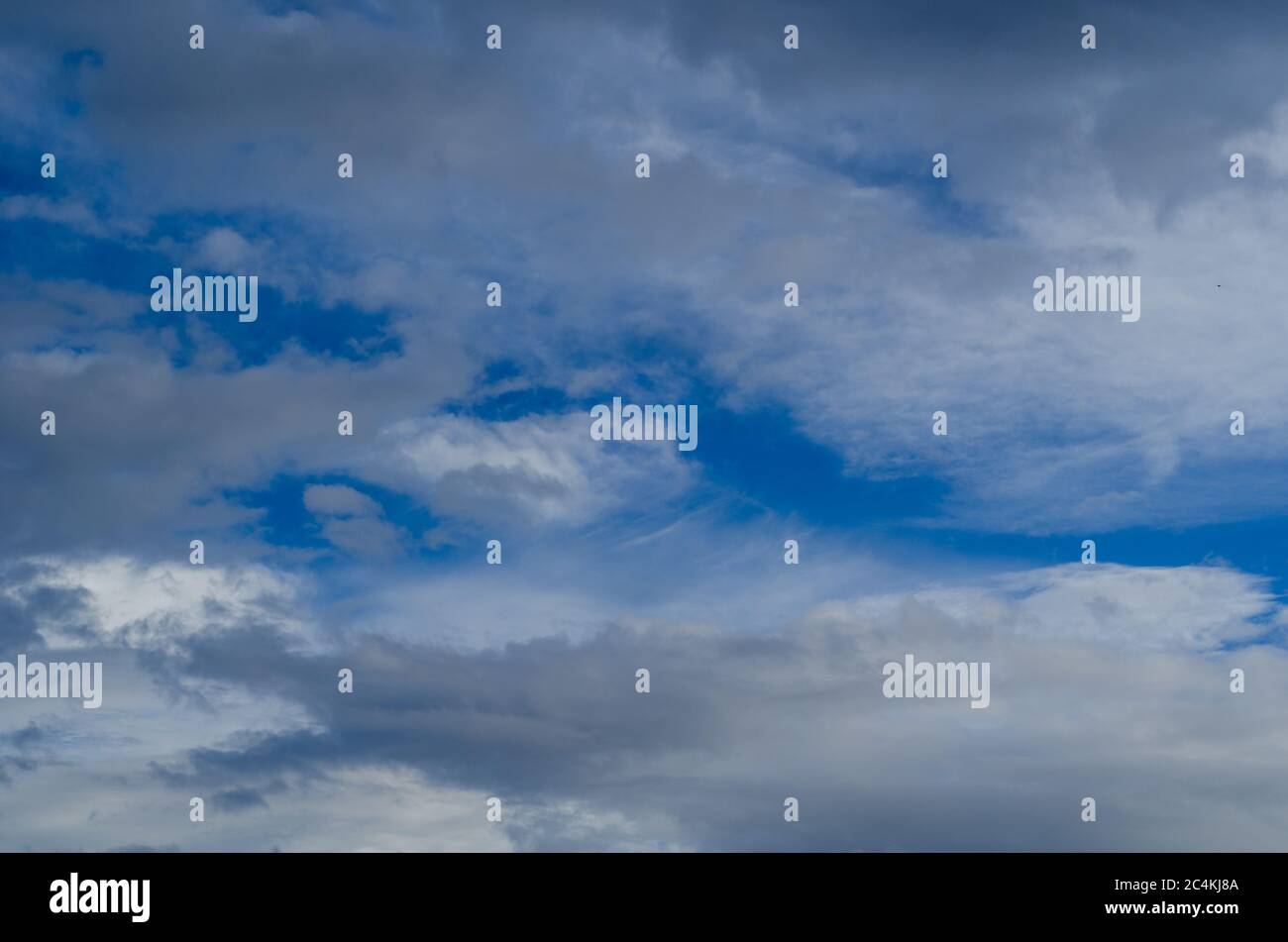 After the rain the clouds start to disperse and the blue sky starts to ...