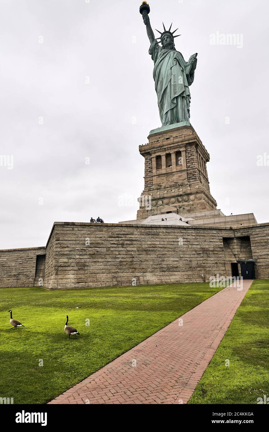 Low angle shot of the amazing Statue of Liberty in New York, USA Stock ...