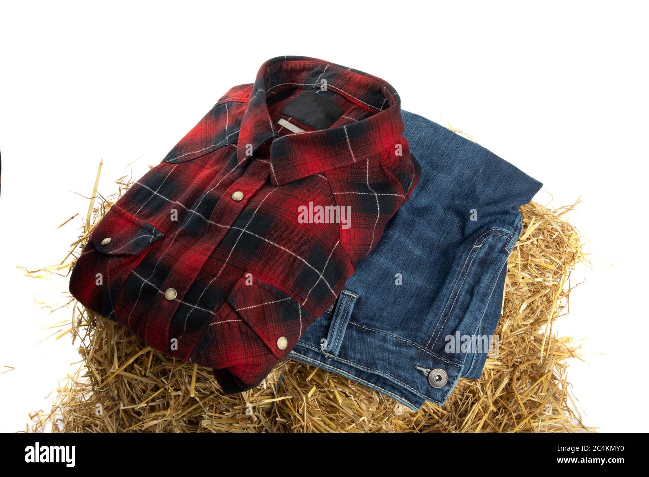 farm fashion, denim blue jeans and a red paid shirt isolated on white ...