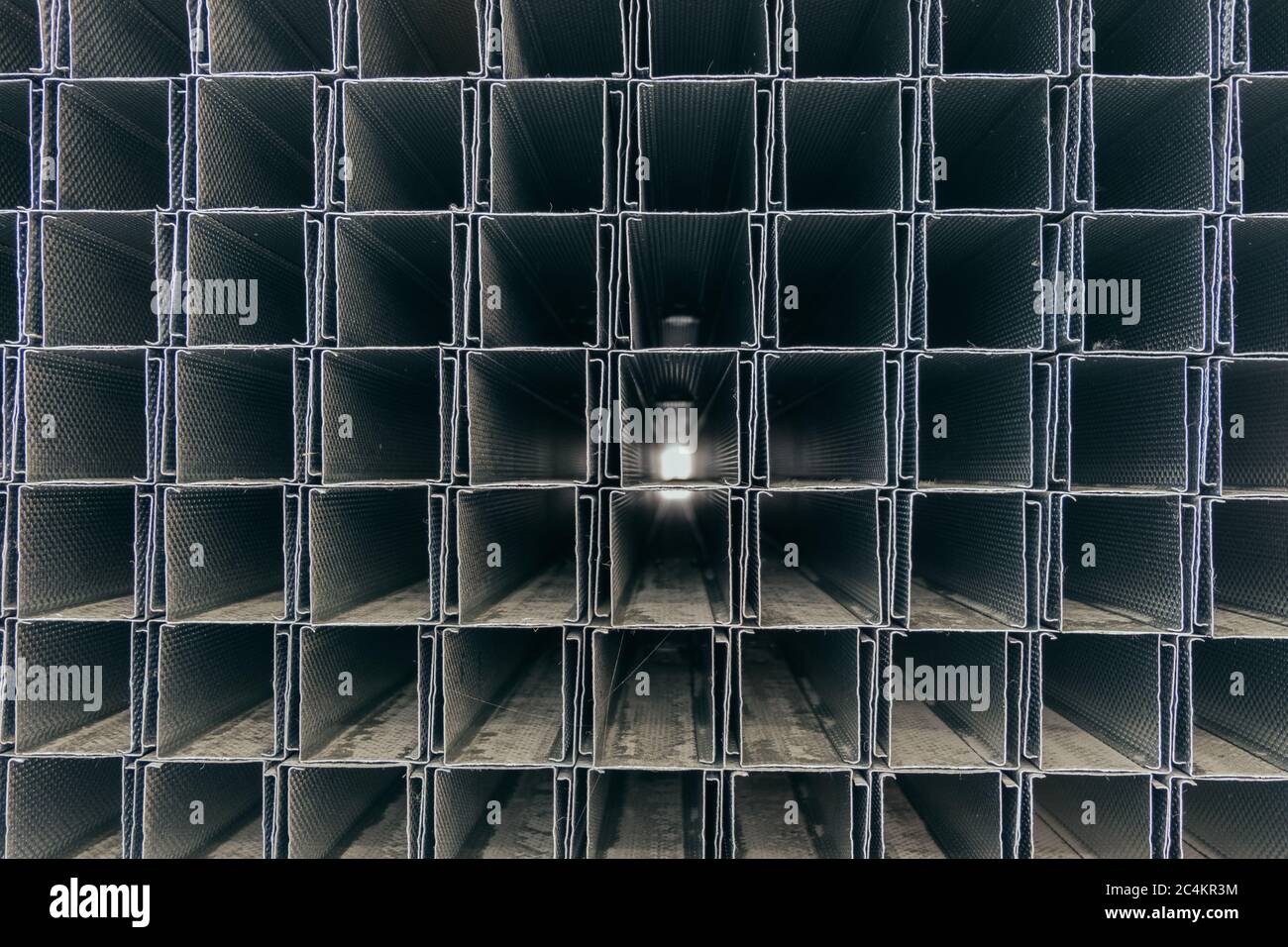 Bent metal profile channel package in storehouse Stock Photo - Alamy