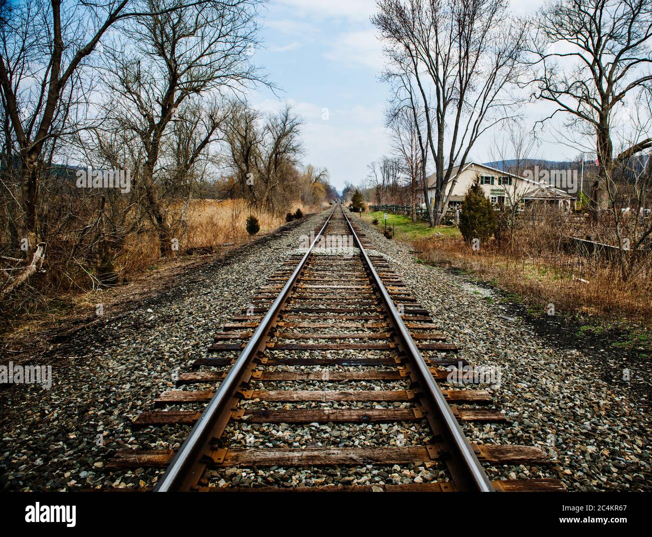 Empty train tracks in Autumn, New York state Stock Photo - Alamy