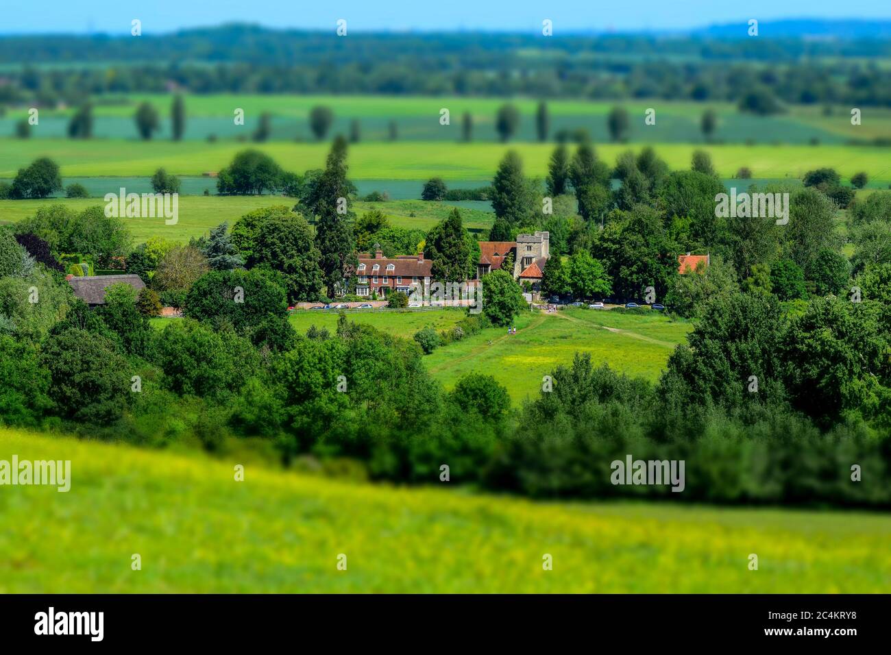 Wide angle shot of the buildings and trees in Wittenham Clumps, UK ...