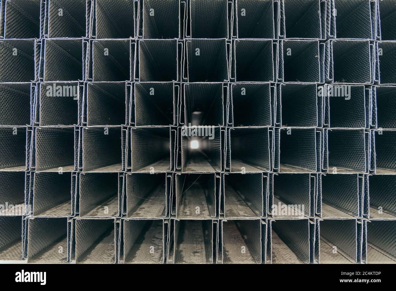 Stack of construction materials in the warehouse Stock Photo - Alamy