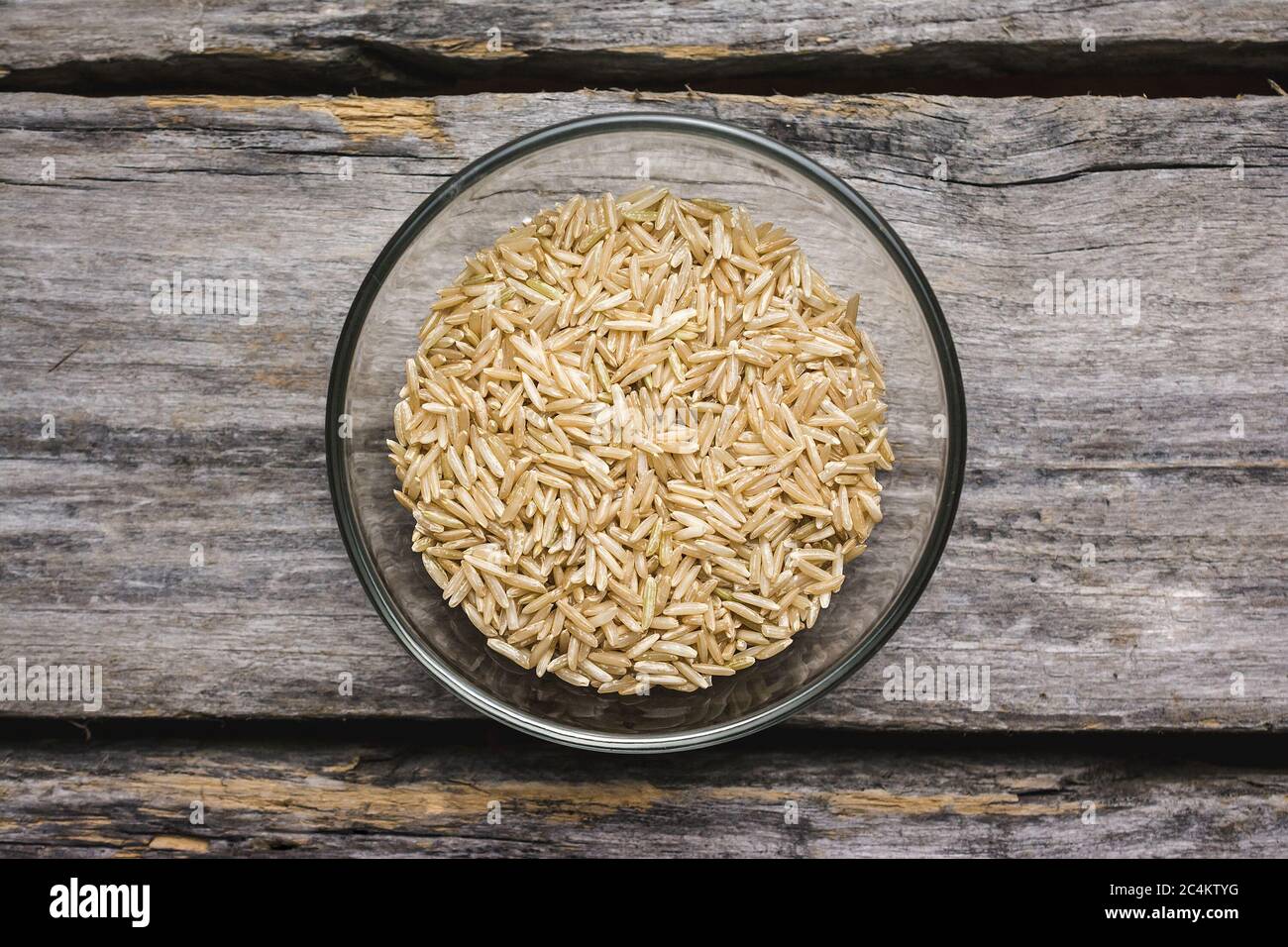 Top view of fresh whole rice in a transparent glass bowl Stock Photo ...