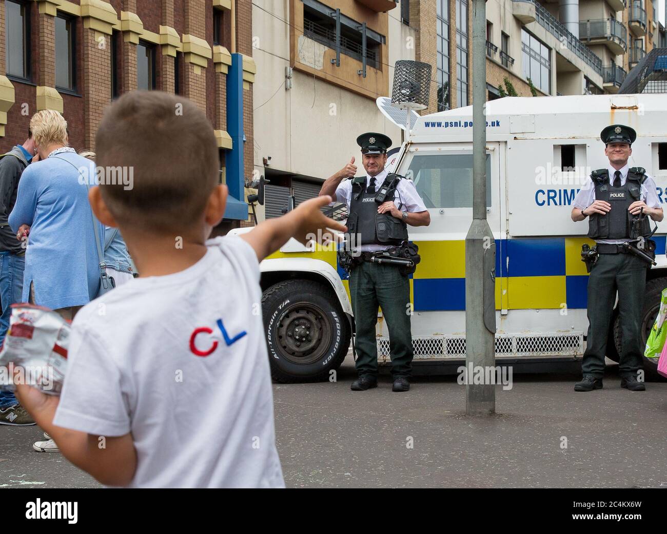 friendly Police in Belfast, Northern Ireland waving to a young child ...