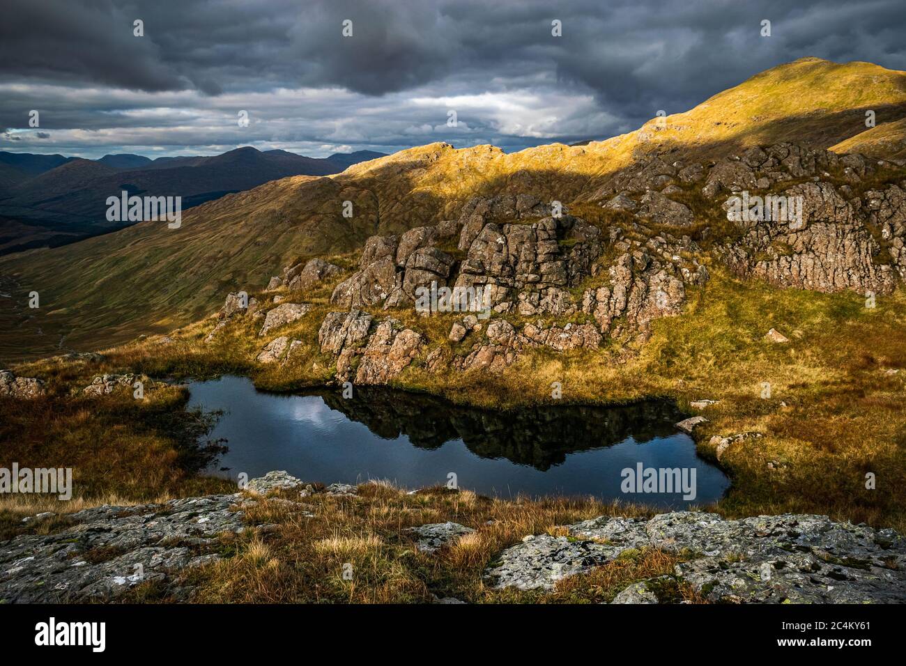 Dramatic Scottish Highlands landscape. Small pond and and dramatic ...