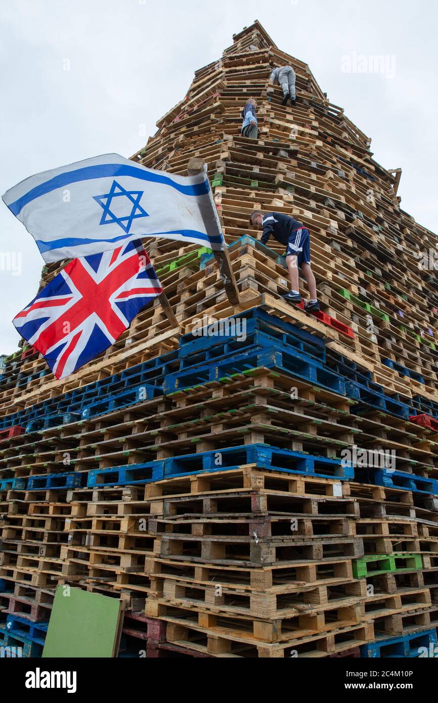 Sandy Row Bonfire with flags, Belfast.Twelfth July Stock Photo - Alamy