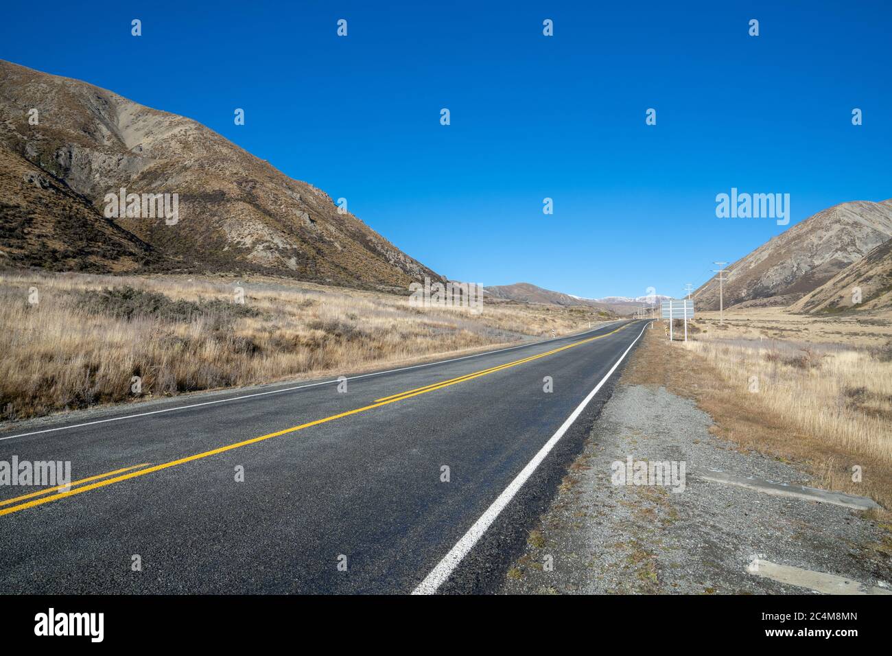 Beautiful highway road with mountain in rural on day time Stock Photo ...