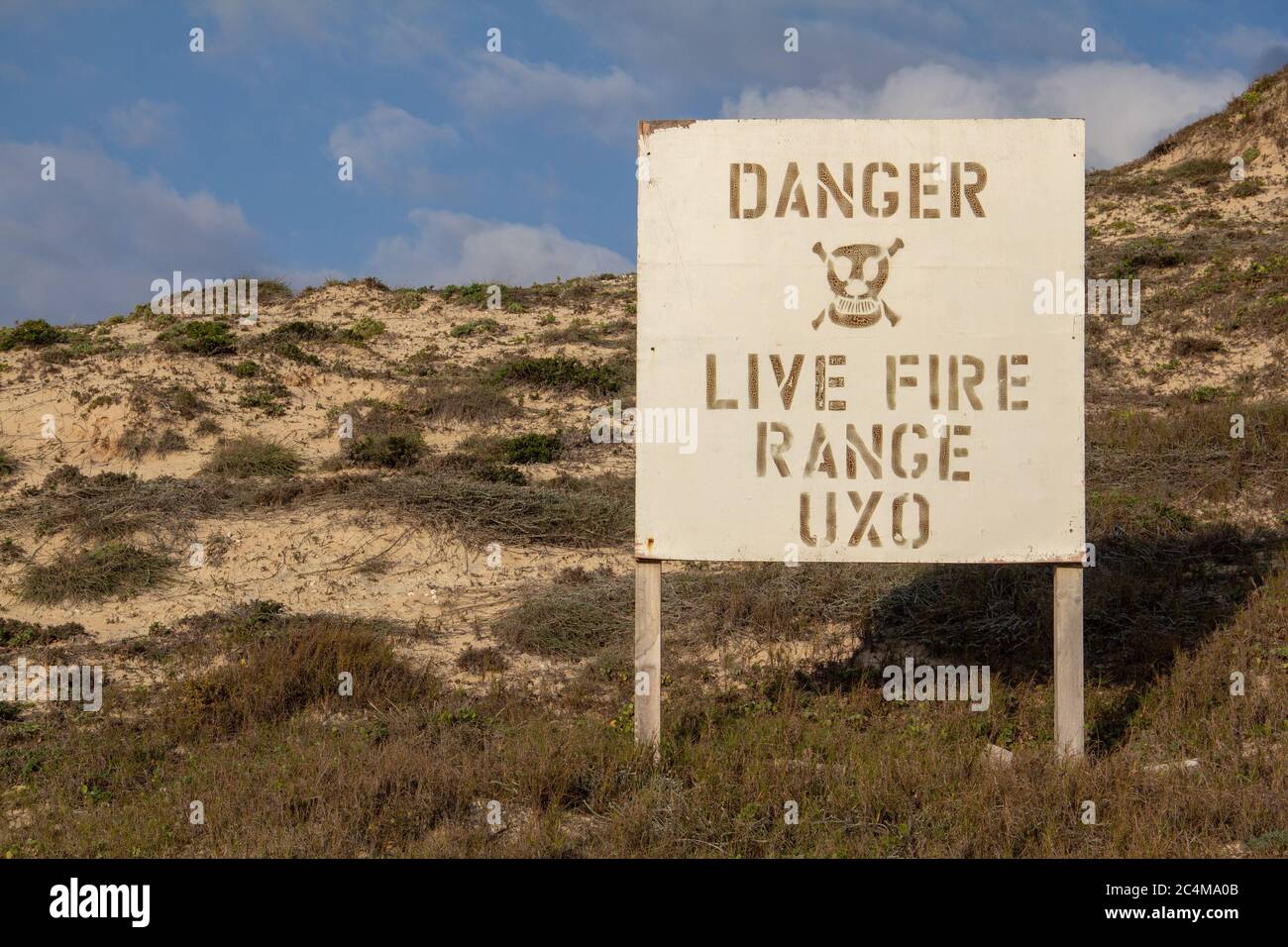 Metal Danger sign informing about Live Fire Range installed in the ...