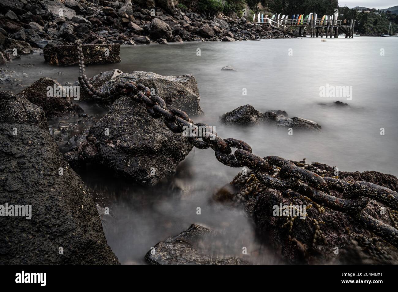 Ship chain in the water, on the sea pier in New Zealand Stock Photo - Alamy