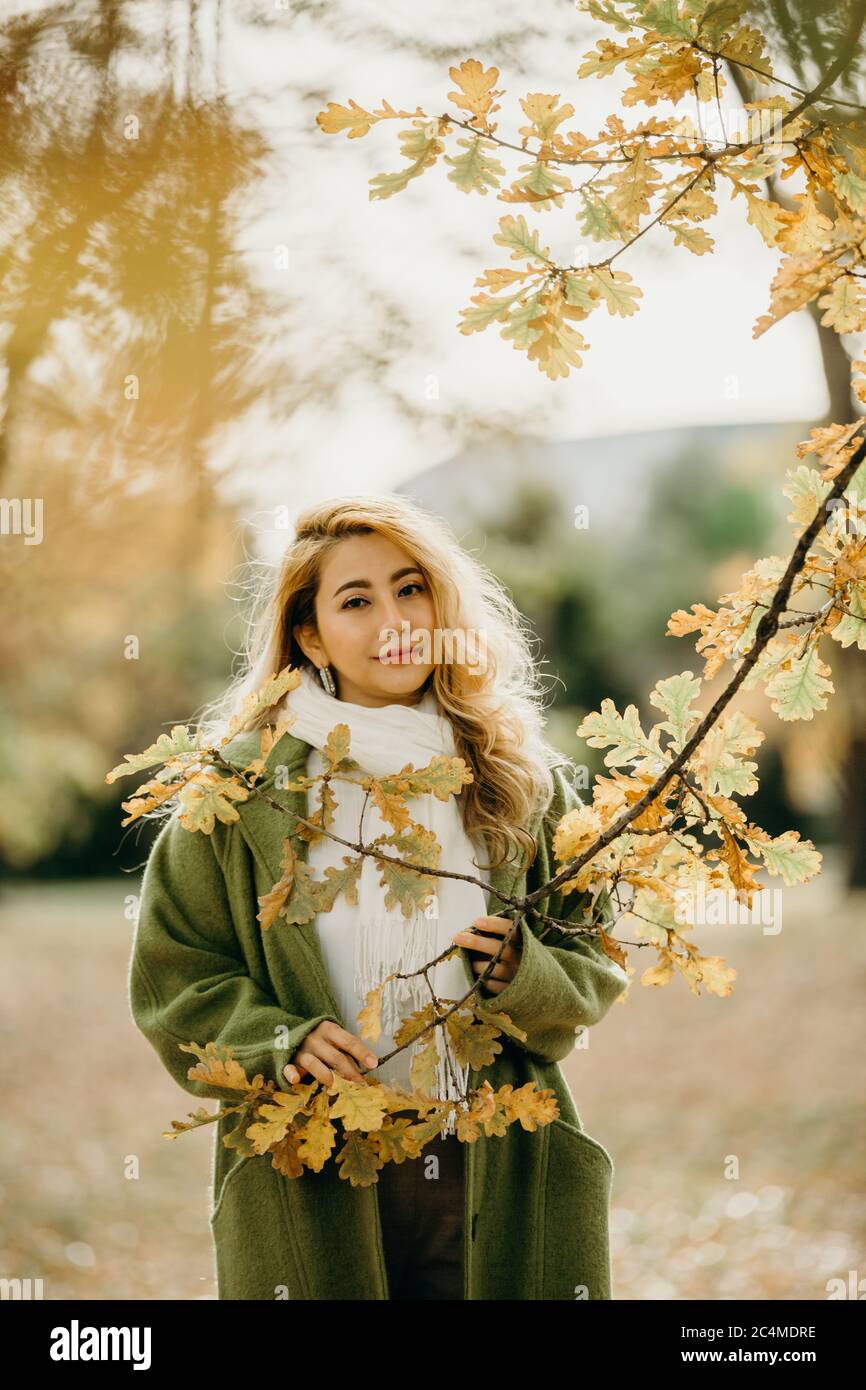 Beautiful Autumn Asian woman with Autumn Leaves on Fall Nature ...