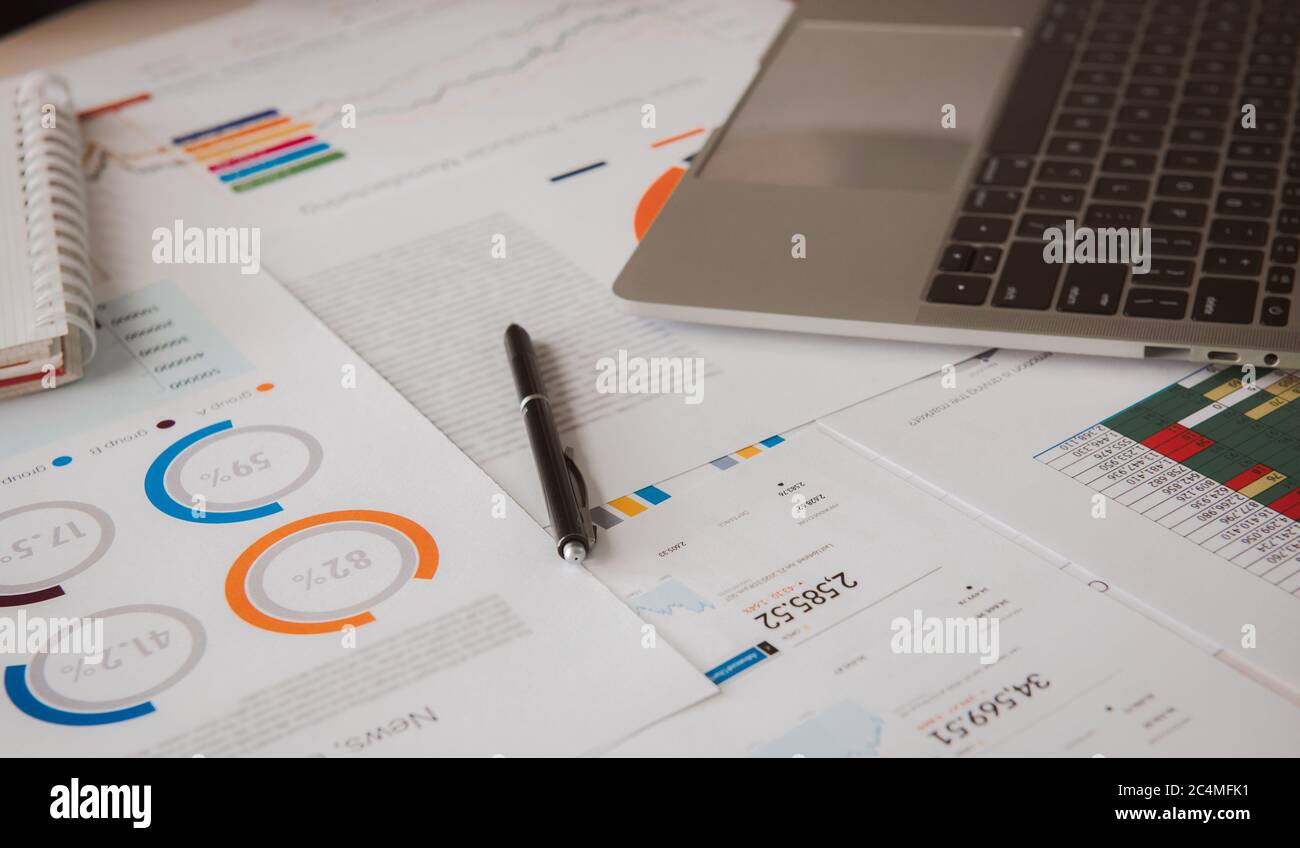 Graphs, charts, business table. The workplace of business people Stock ...