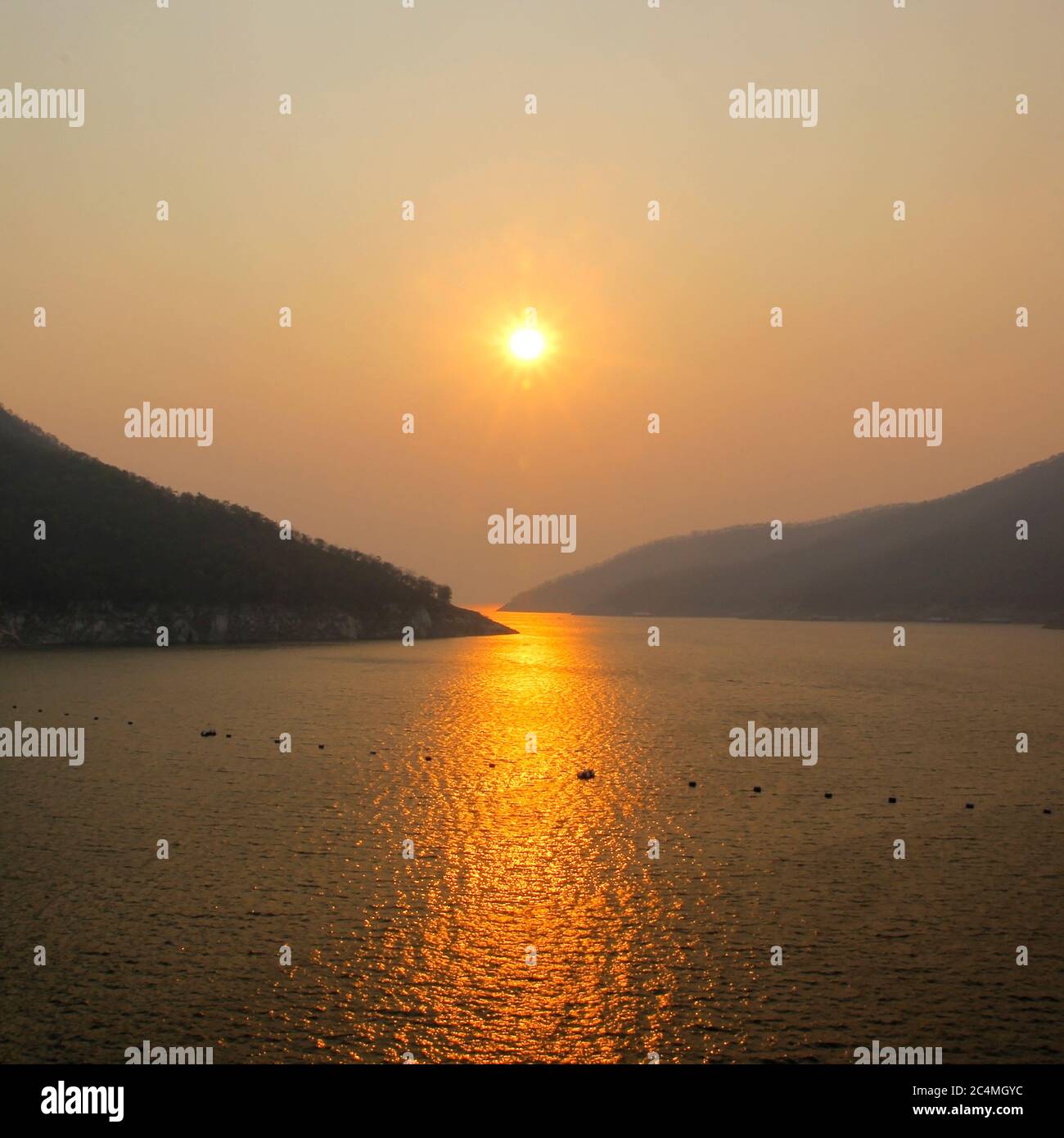 beautiful sunset over the river as nature background Stock Photo - Alamy