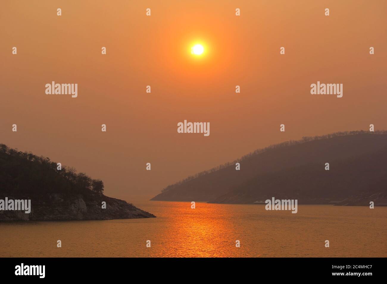 beautiful sunset over the river as nature background Stock Photo - Alamy