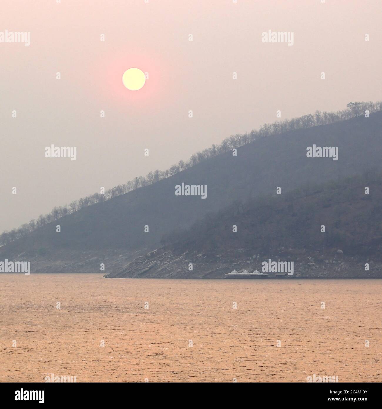 beautiful sunset over the river as nature background Stock Photo - Alamy