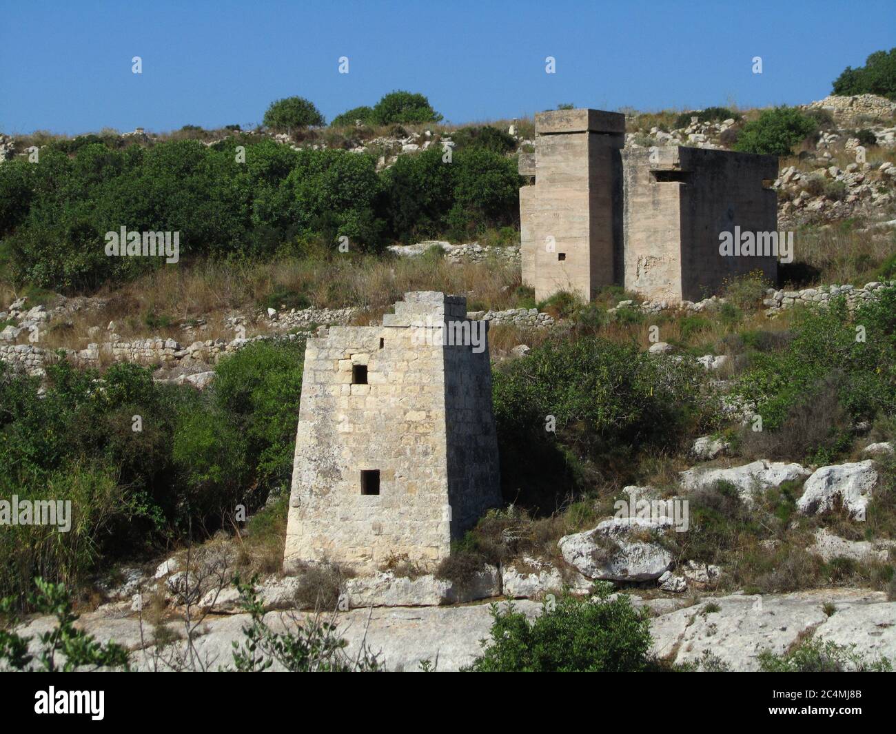 BIRZEBBUGA, MALTA - Jun 29, 2014: Old watch tower and British WWII pill ...