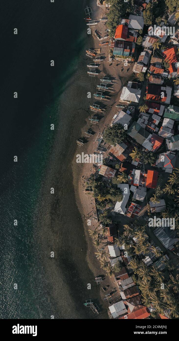 Aerial Shot of a Small Fishing Village in a Countryside Island in the ...