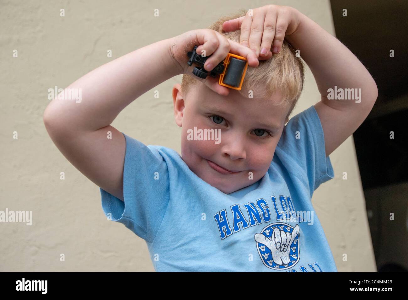 These children pose for the camera in front of their home in San Rafael ...