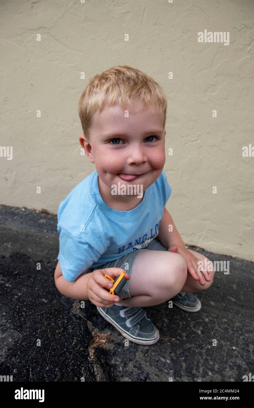 These children pose for the camera in front of their home in San Rafael ...