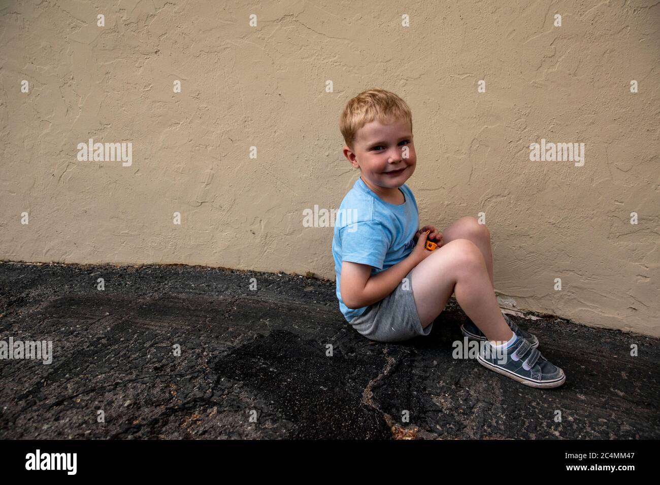 These children pose for the camera in front of their home in San Rafael ...