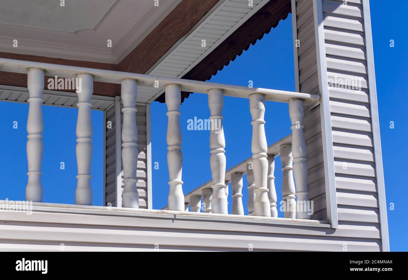 Low angle shot of the white balcony pillars made from marble Stock ...