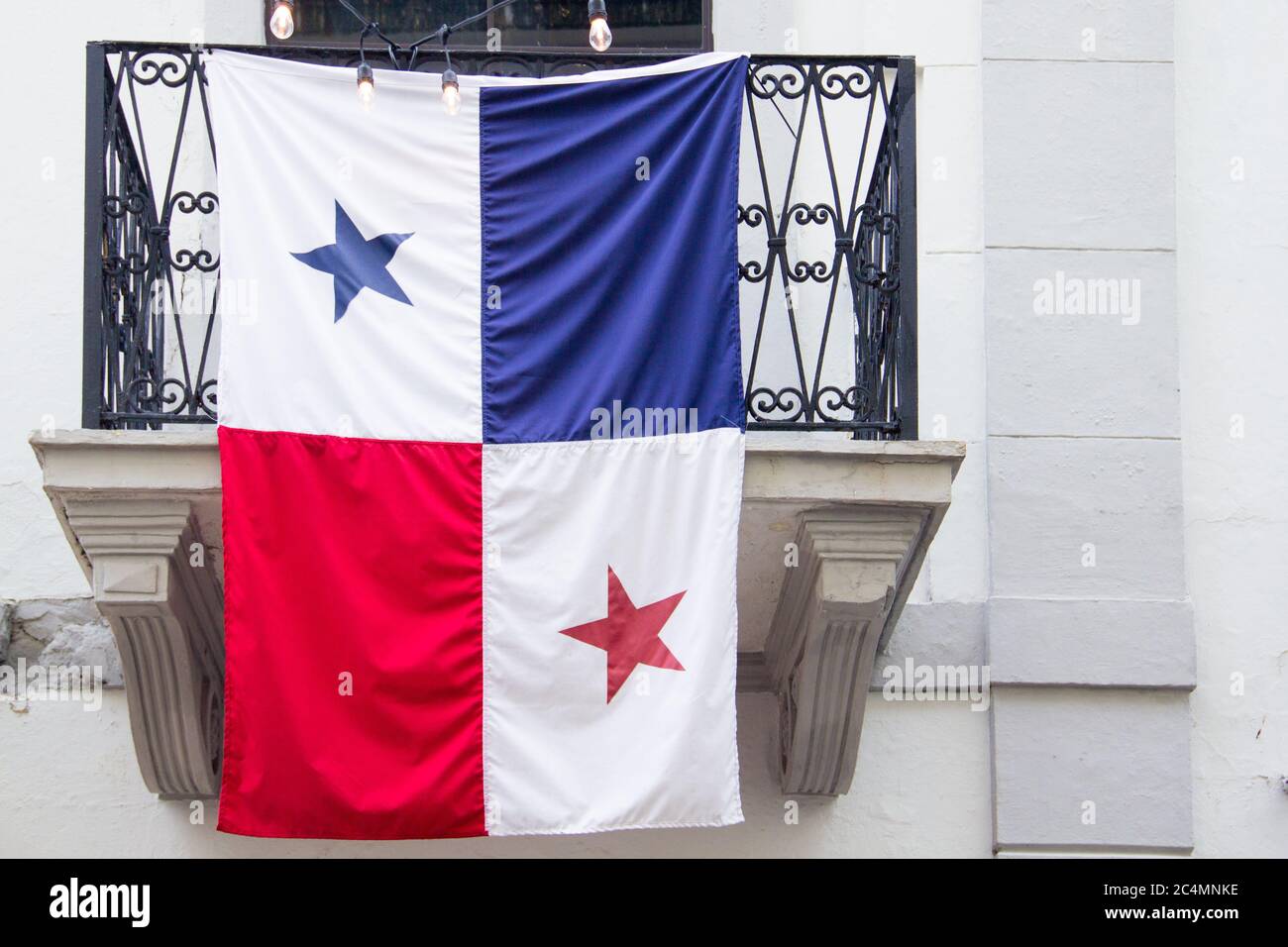 Closeup of the flag of Panama hanging from the balcony under the ...
