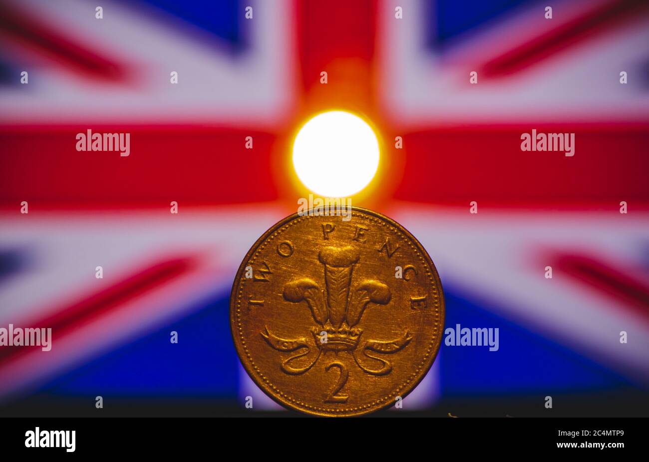 British coin 2 pence (2001) isolated on (UK) United kingdom flag ...