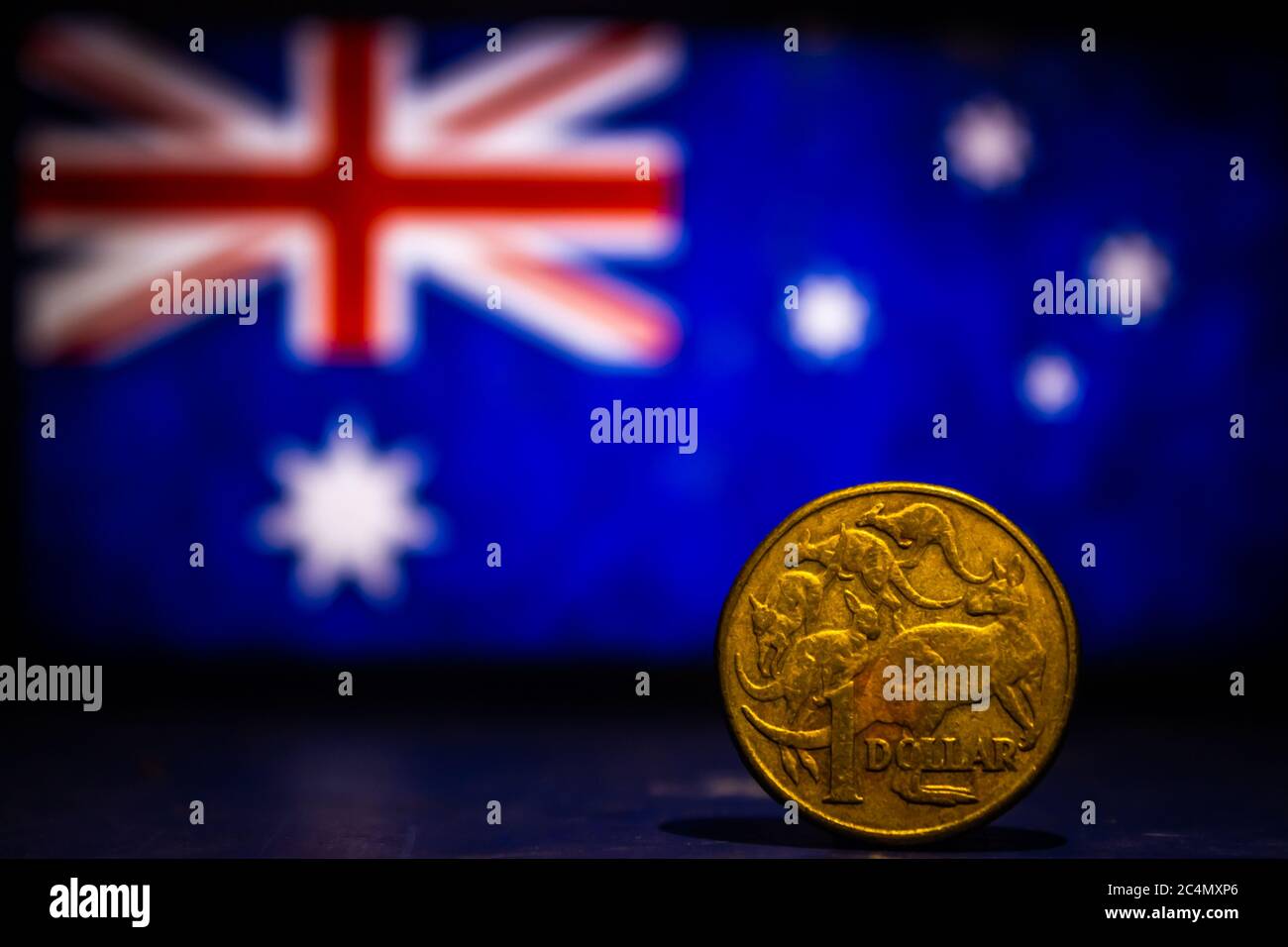 Australian dollar coin isolated on Australia flag background with space ...