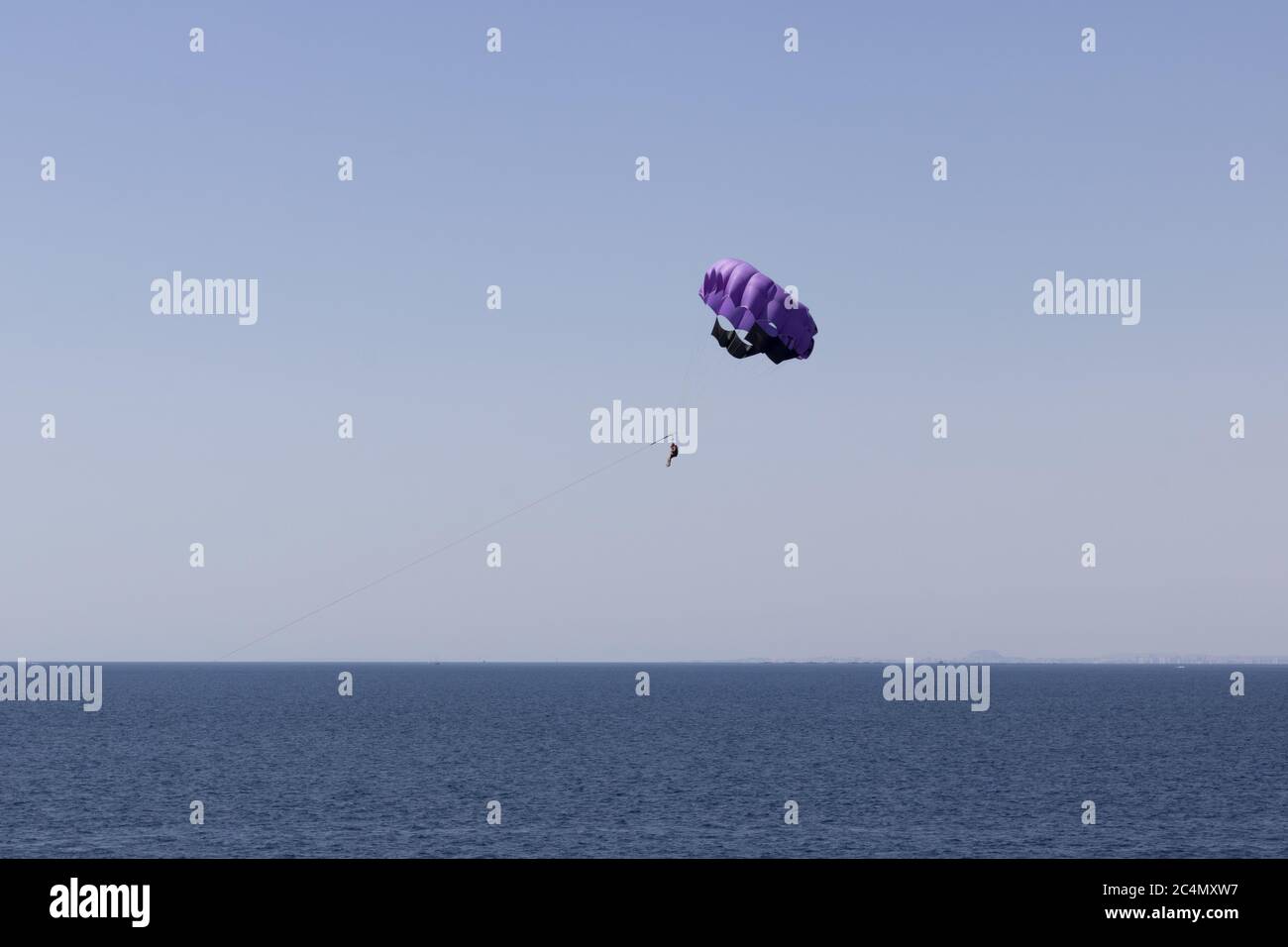 Purple parachute hi-res stock photography and images - Alamy