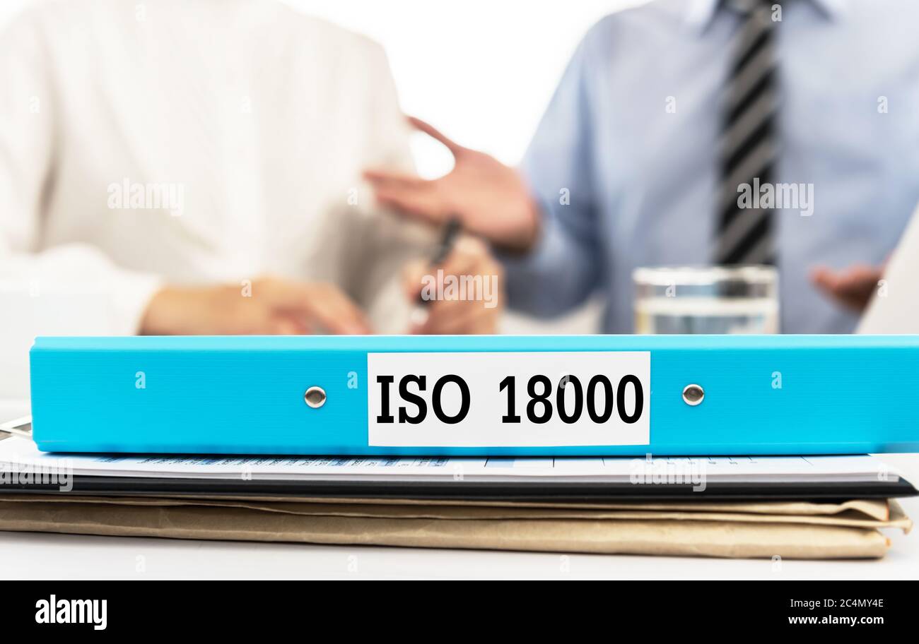 ISO 18000 concept with manager and auditor talking about management ...