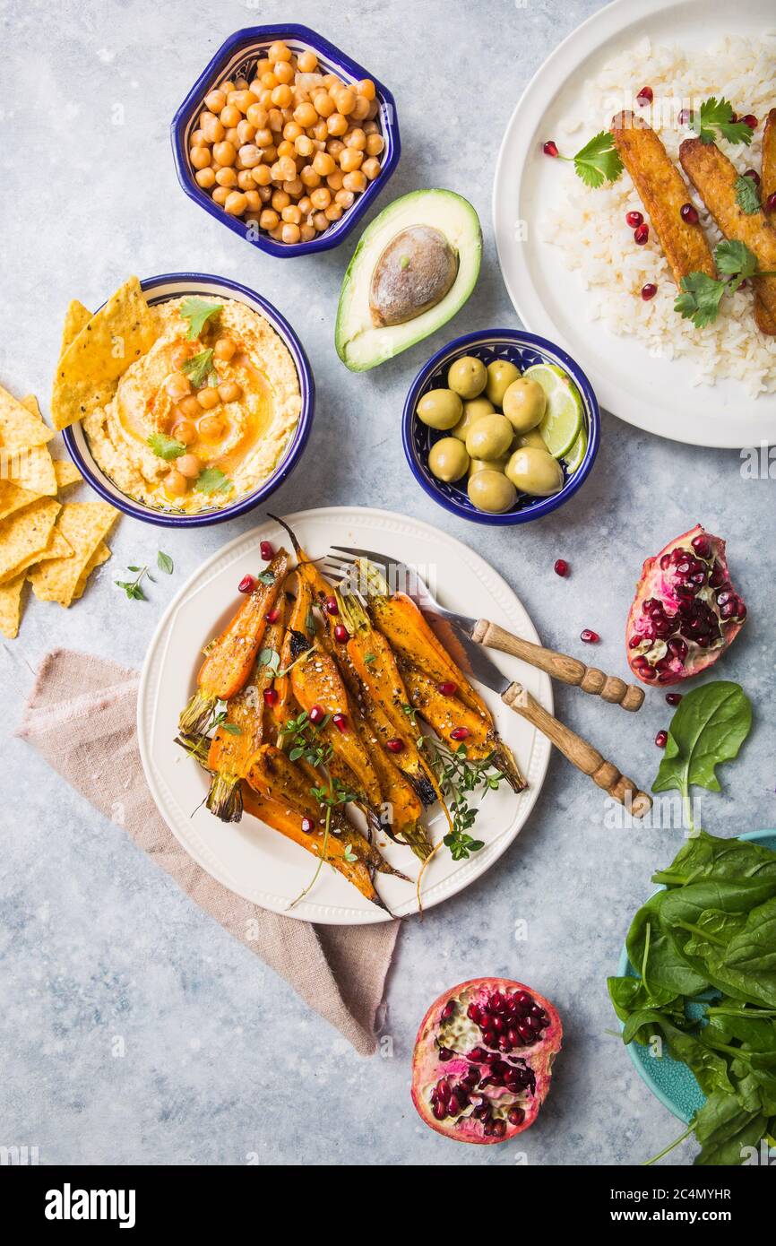 Variety of healthy snacks, gourmet dips and nuts. Hummus, roasted ...