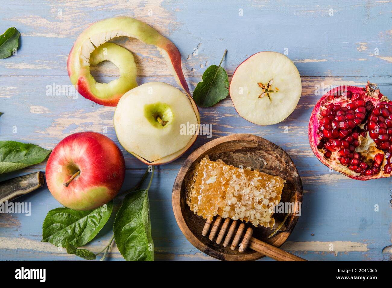 Rosh hashanah (Hashana) - jewish New Year holiday concept. Traditional symbols: Honey jar and ...