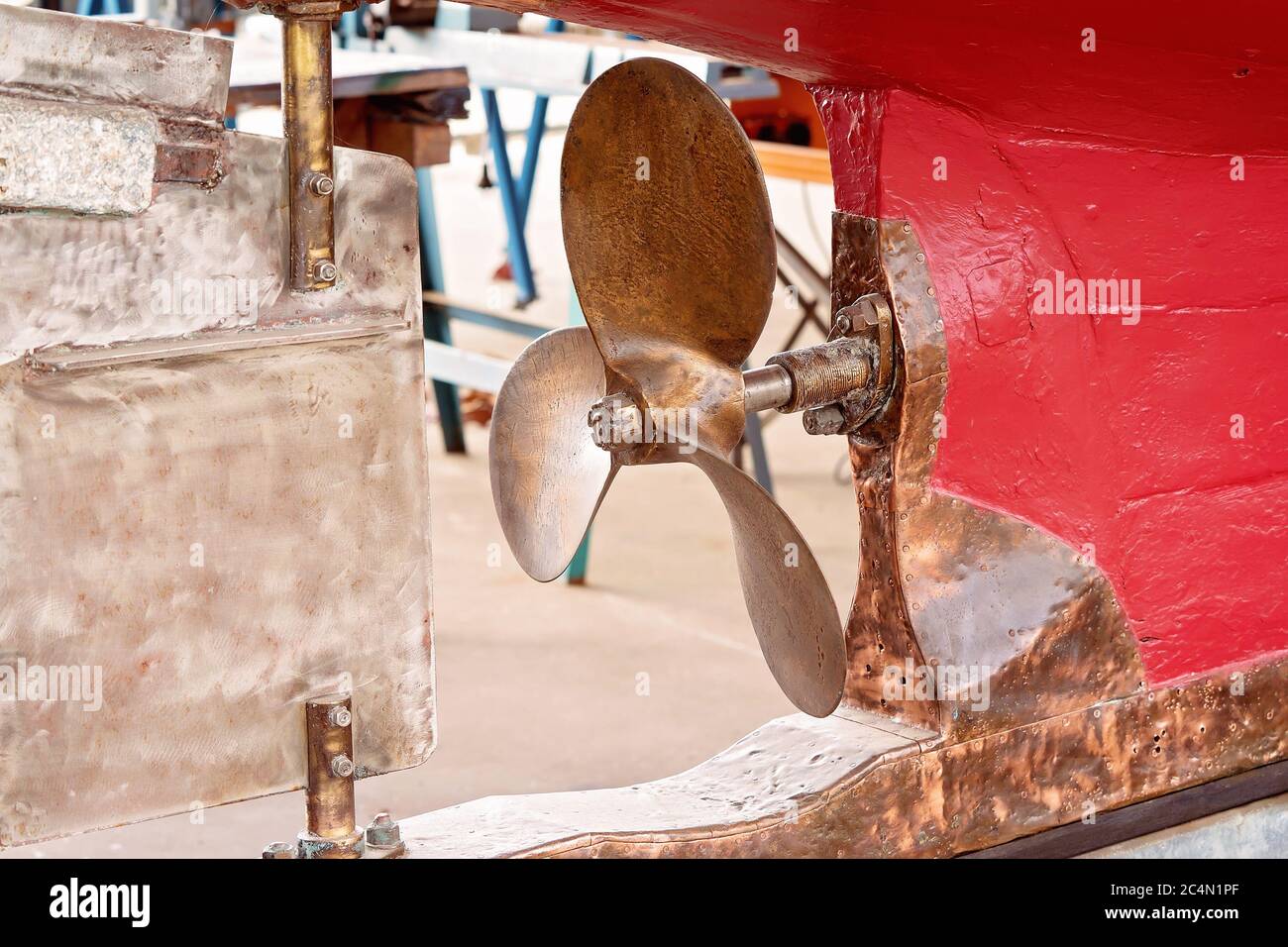 A boat rudder and propeller in closeup at a maritime museum Stock Photo ...