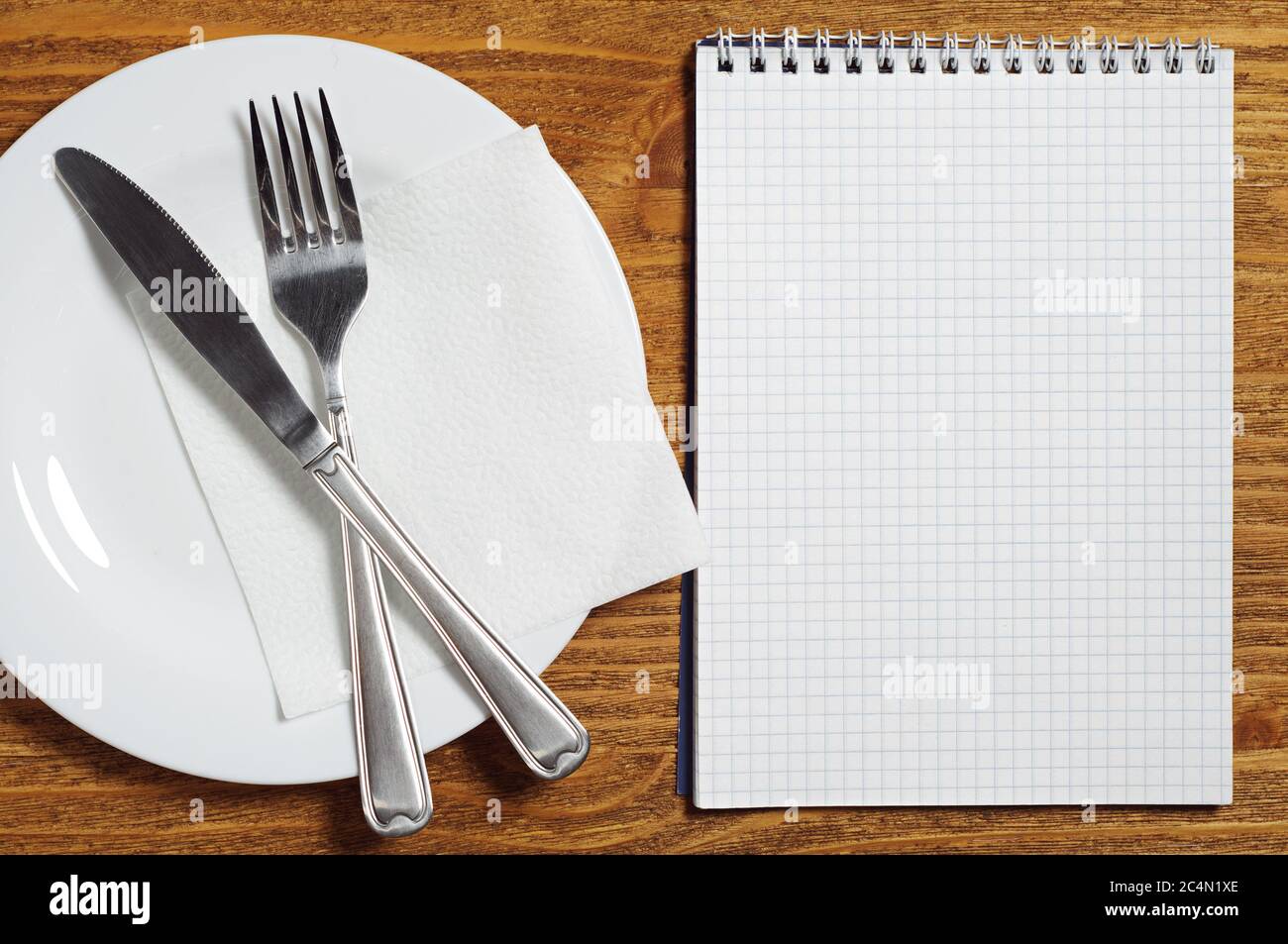 Notepad and cutlery. You can use as a template for a menu of cafes and ...