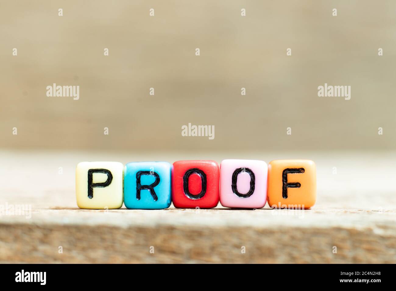 Colorful bead with black letter in word proof on wood background Stock ...
