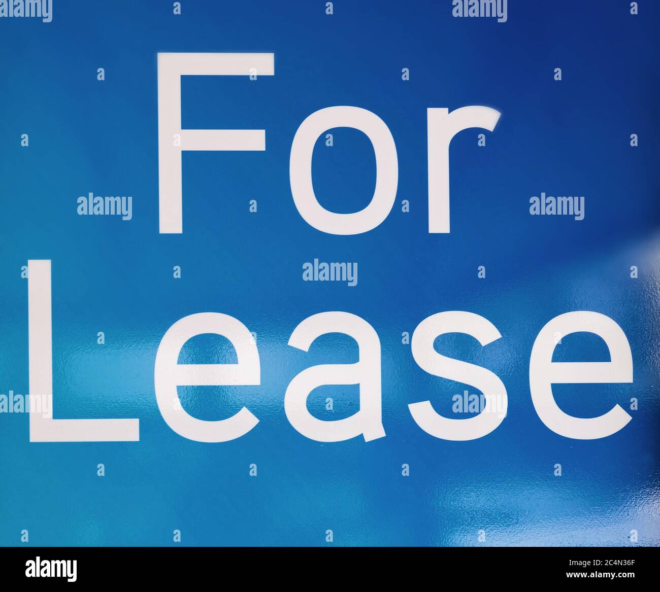Blue For Lease sign with white lettering on blue background Stock Photo ...