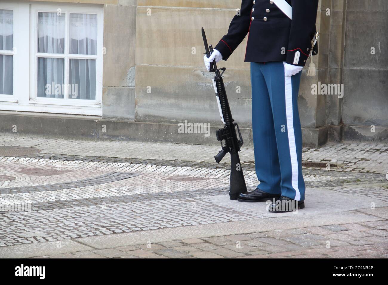 Royal guard with a weapon in a special uniform in Copenhagen, Denmark ...