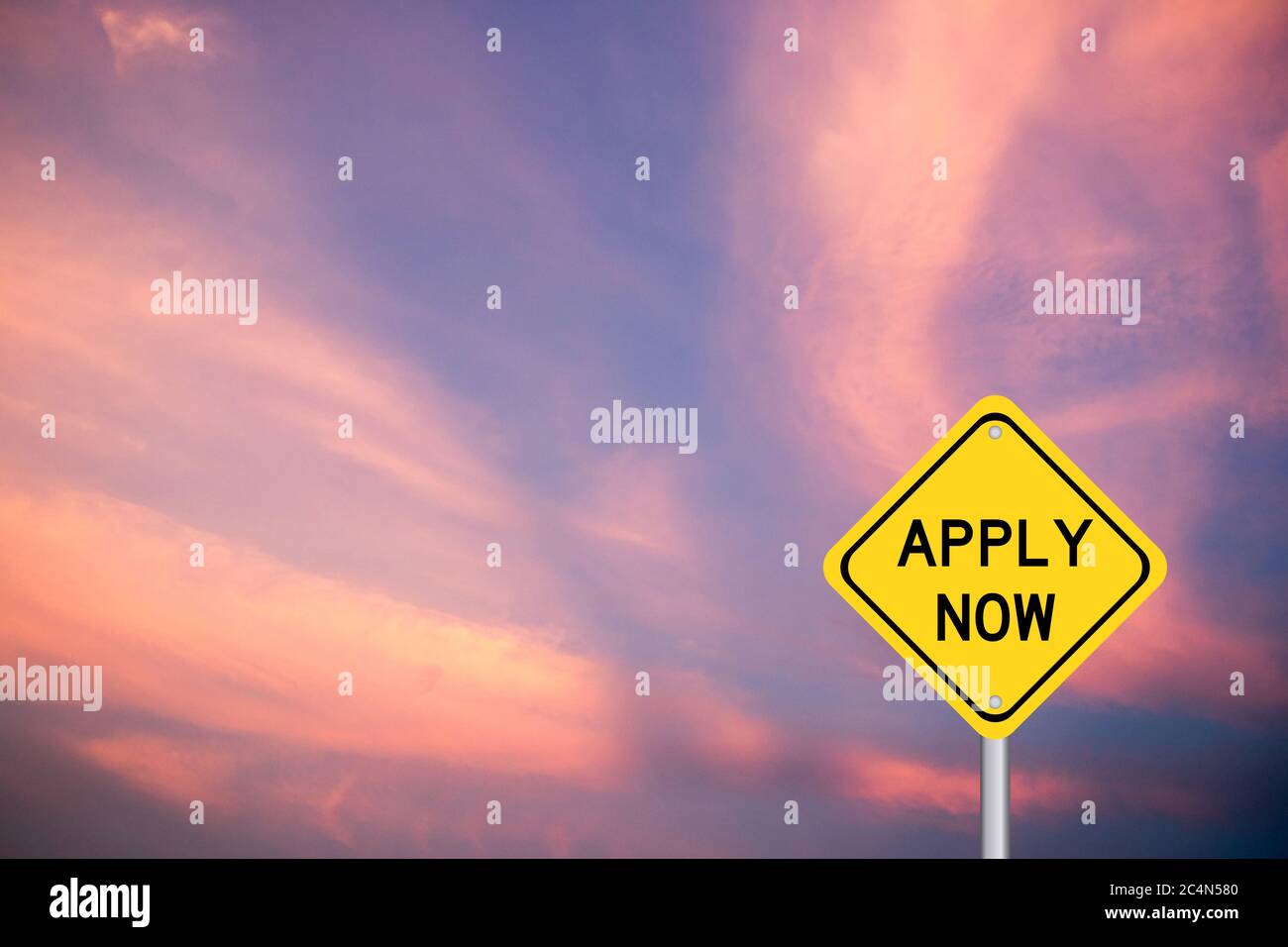 Yellow color transportation sign with word apply now on violet cloud ...