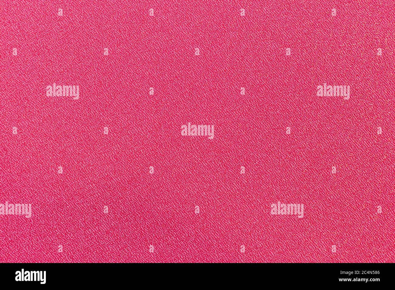 Red color fabric clothes textured background Stock Photo - Alamy