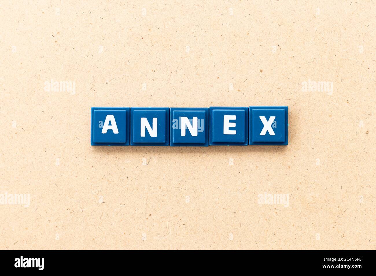 Tile alphabet letter in word annex on wood background Stock Photo - Alamy