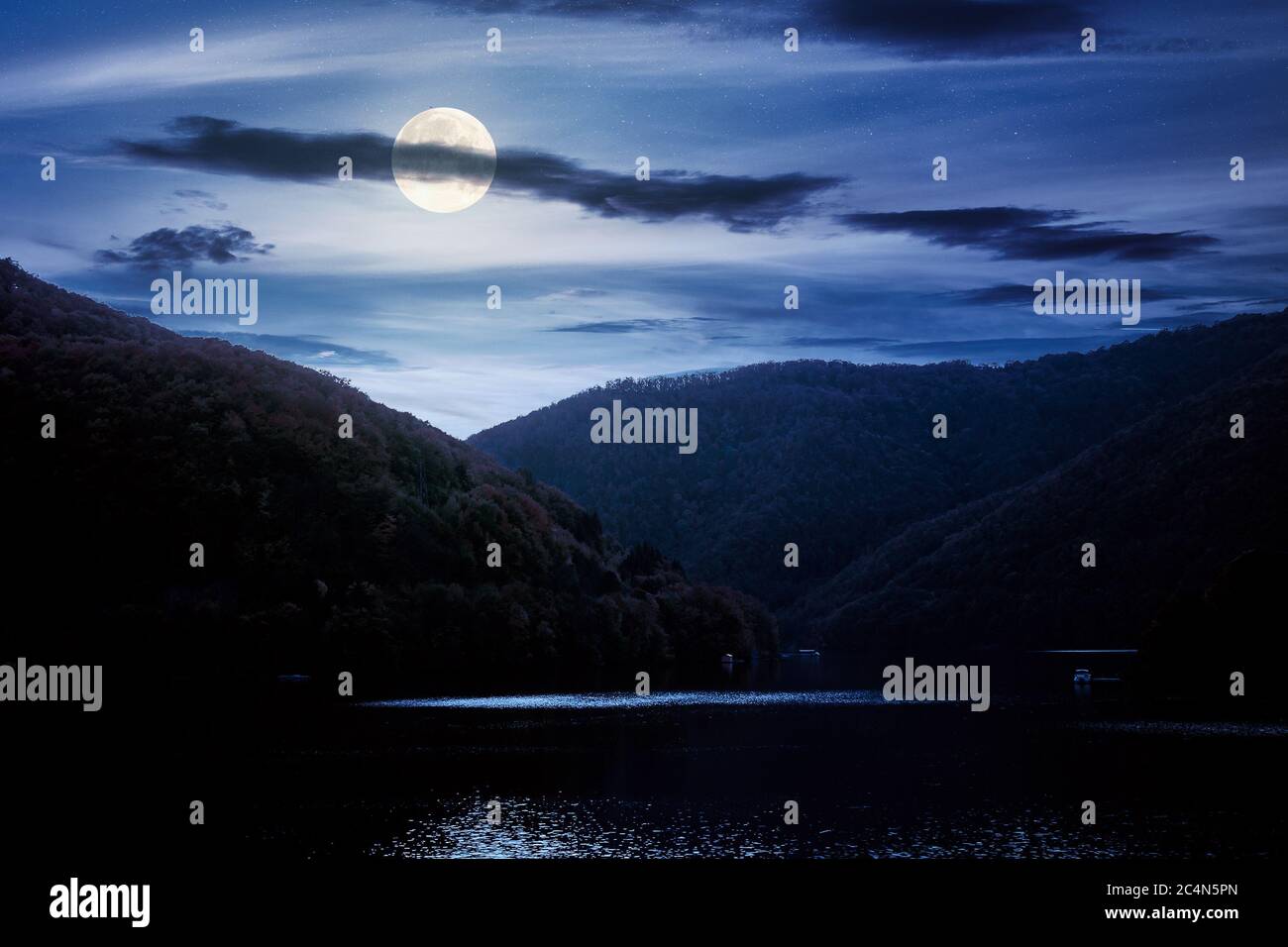 tarnita lake in romania at night. beautiful nature scenery in autumn in ...