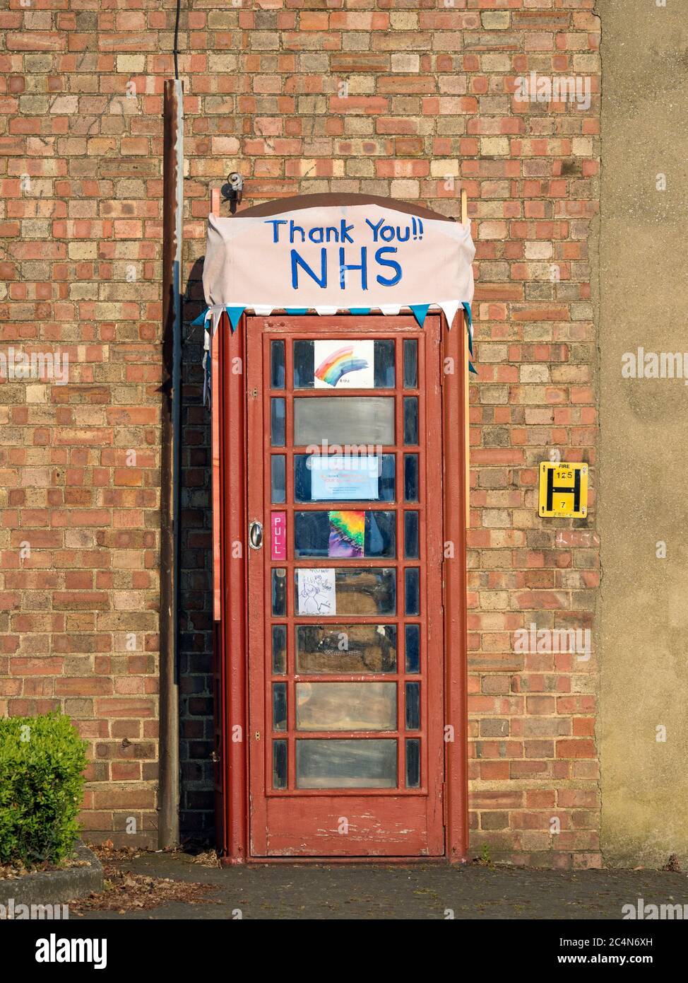 Thank you NHS sign on old telephone box, Haddenham, Cambridgeshire ...