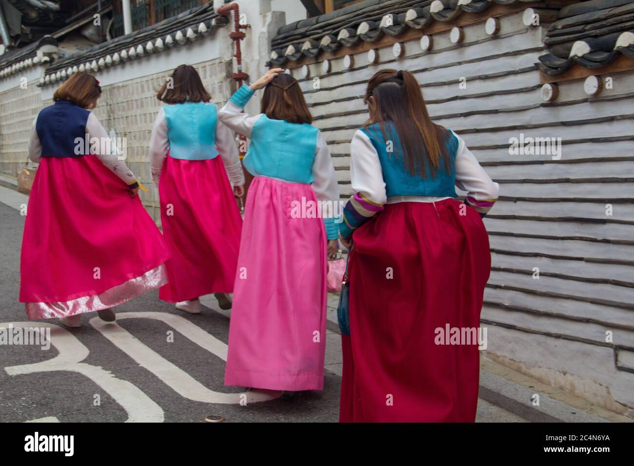 Beautiful women wearing Korean traditional hanboks near the old palace ...