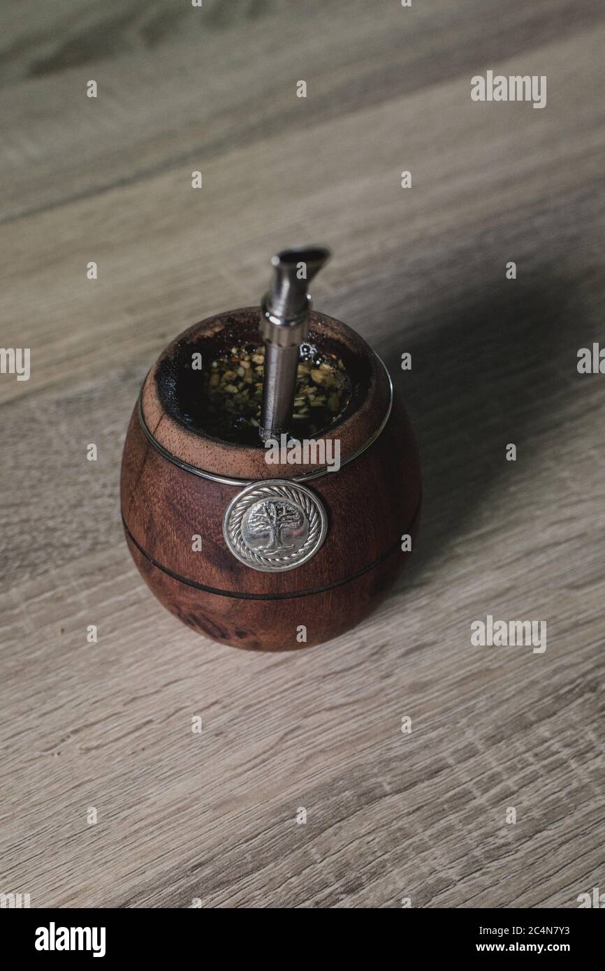 Argentinian Yerba Mate tea in an eco-friendly wooden container with a ...