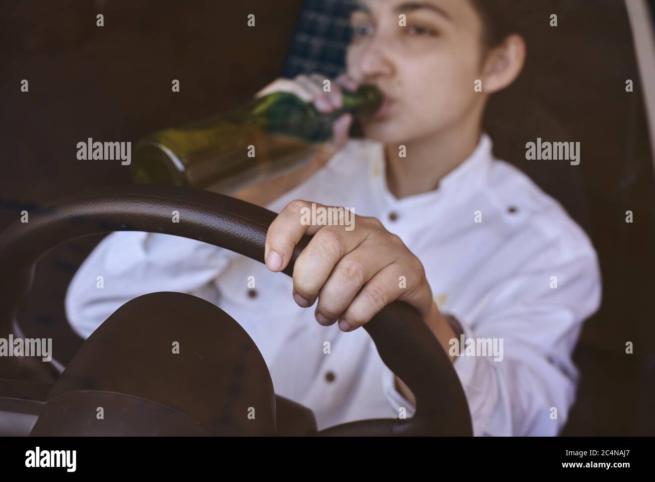 Drunk woman driving car beer hi-res stock photography and images - Alamy