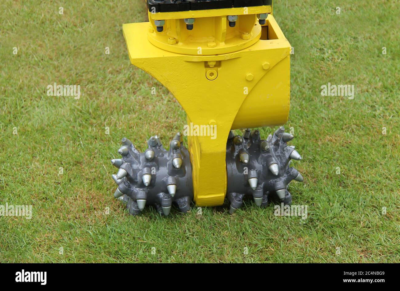 A Hydraulic Rock Cutting Drum for Excavator Work Stock Photo - Alamy