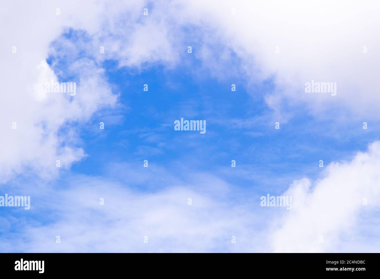 Clear blue color sky with white cloud background Stock Photo - Alamy