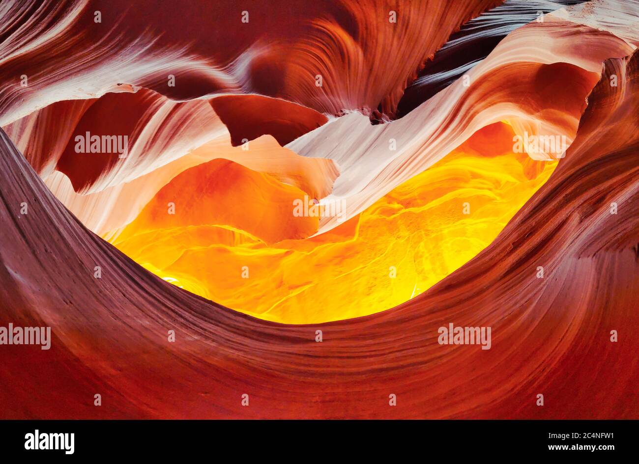 Amazing shot of an orange wave cave under sunlight Stock Photo - Alamy